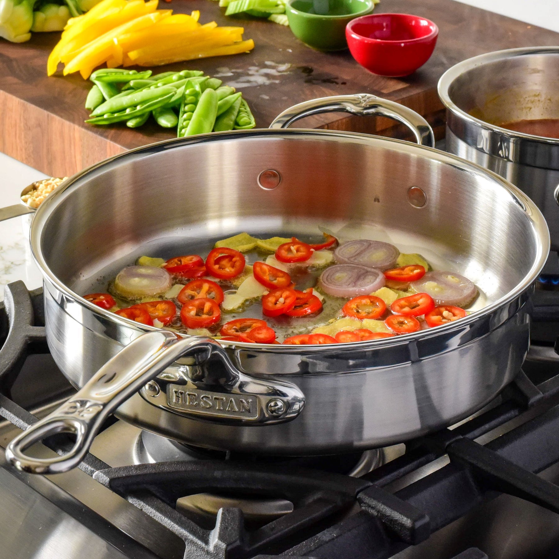 Professional Clad Stainless Steel Covered Sauté Pans – Hestan Culinary